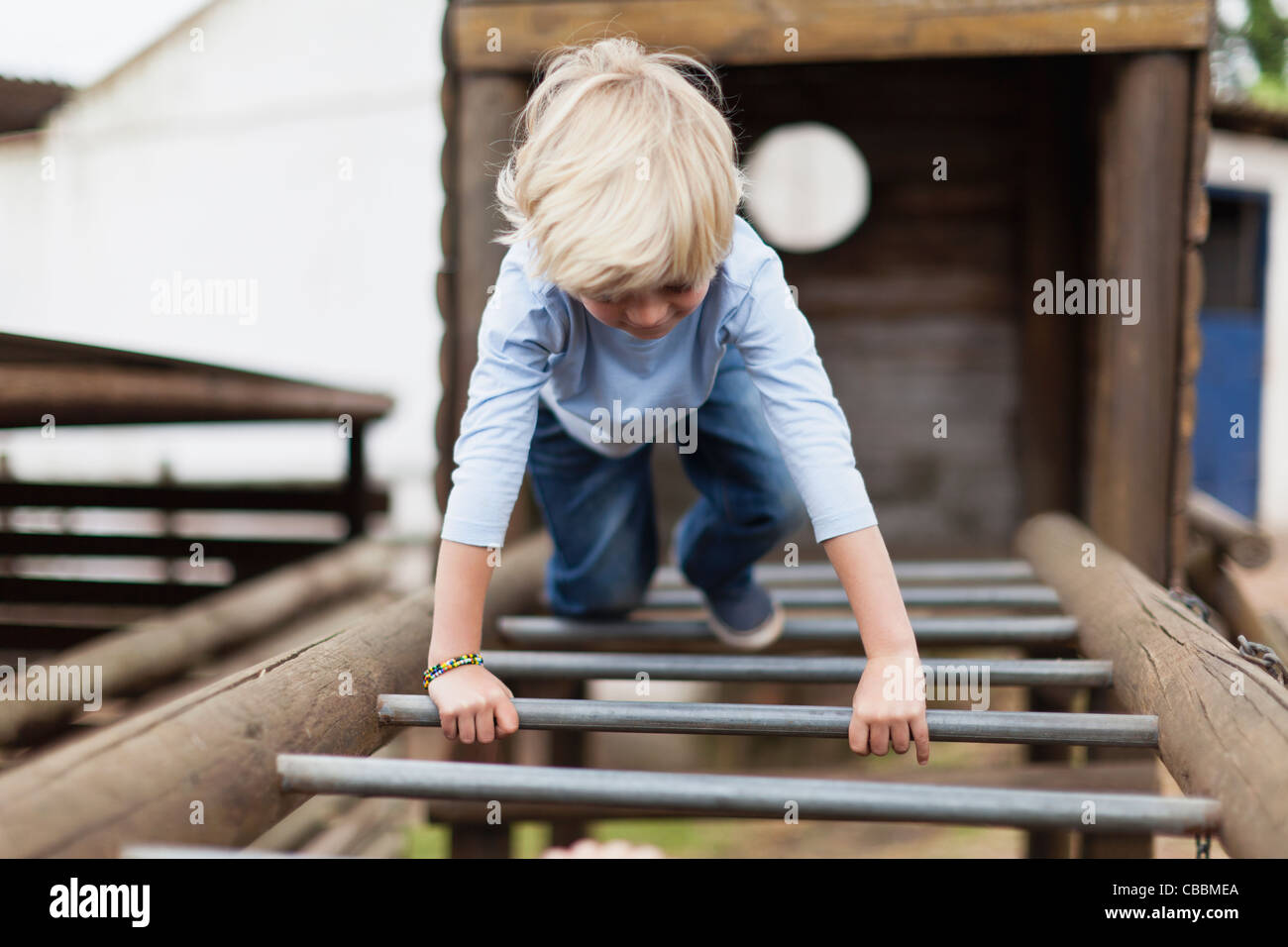 Children playing outdoors on monkey bars hi-res stock photography and ...