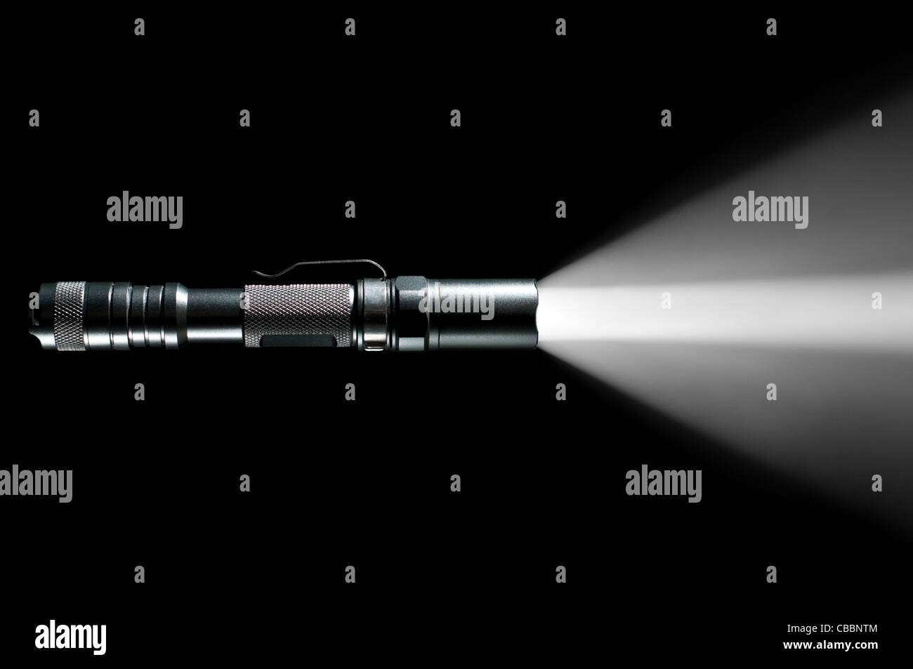 tactical police and military flashlight on black background with ...