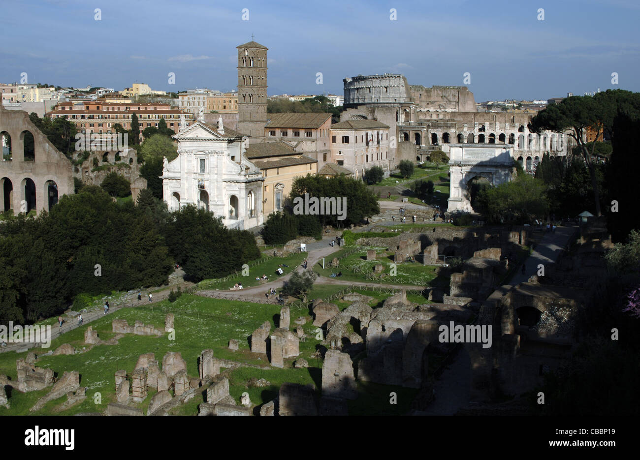 Italy. Rome. Panorama of the Roman Forum. At background, the Colosseum ...