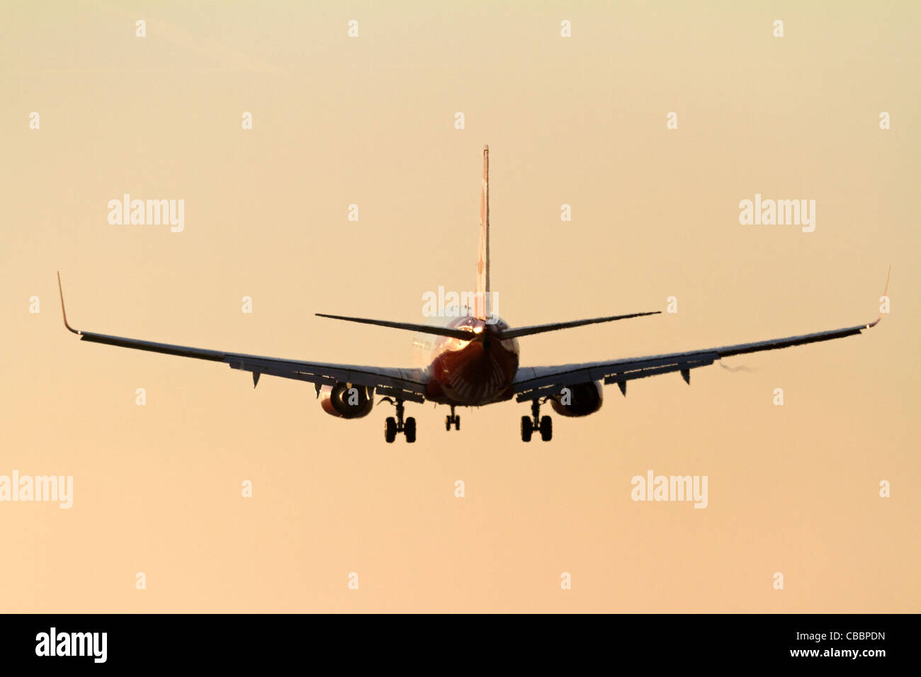 Aircraft in sunrise Stock Photo - Alamy
