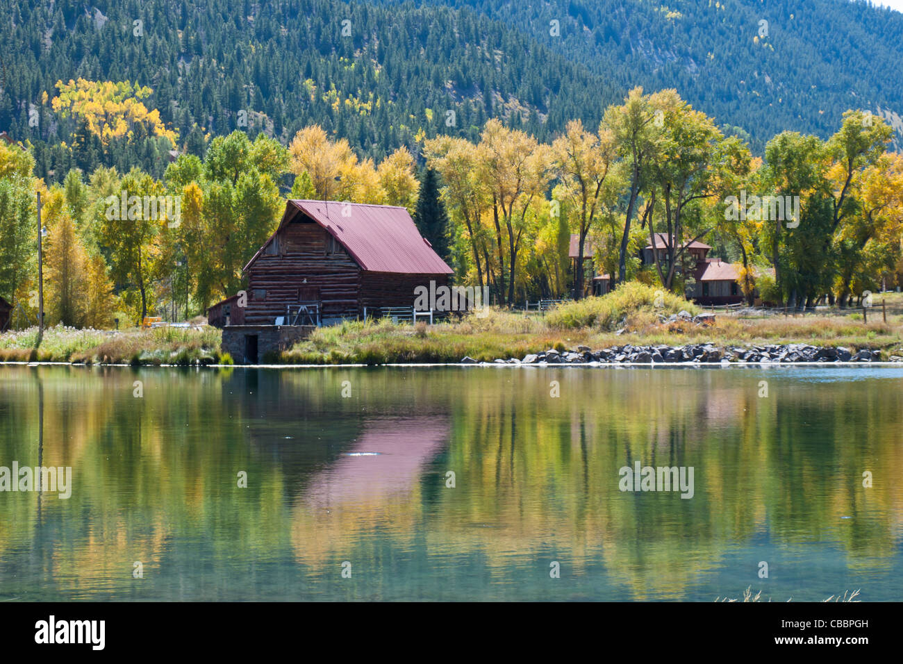 Old barn by the lake in autumn. Near Lake City, Colorado Stock Photo ...