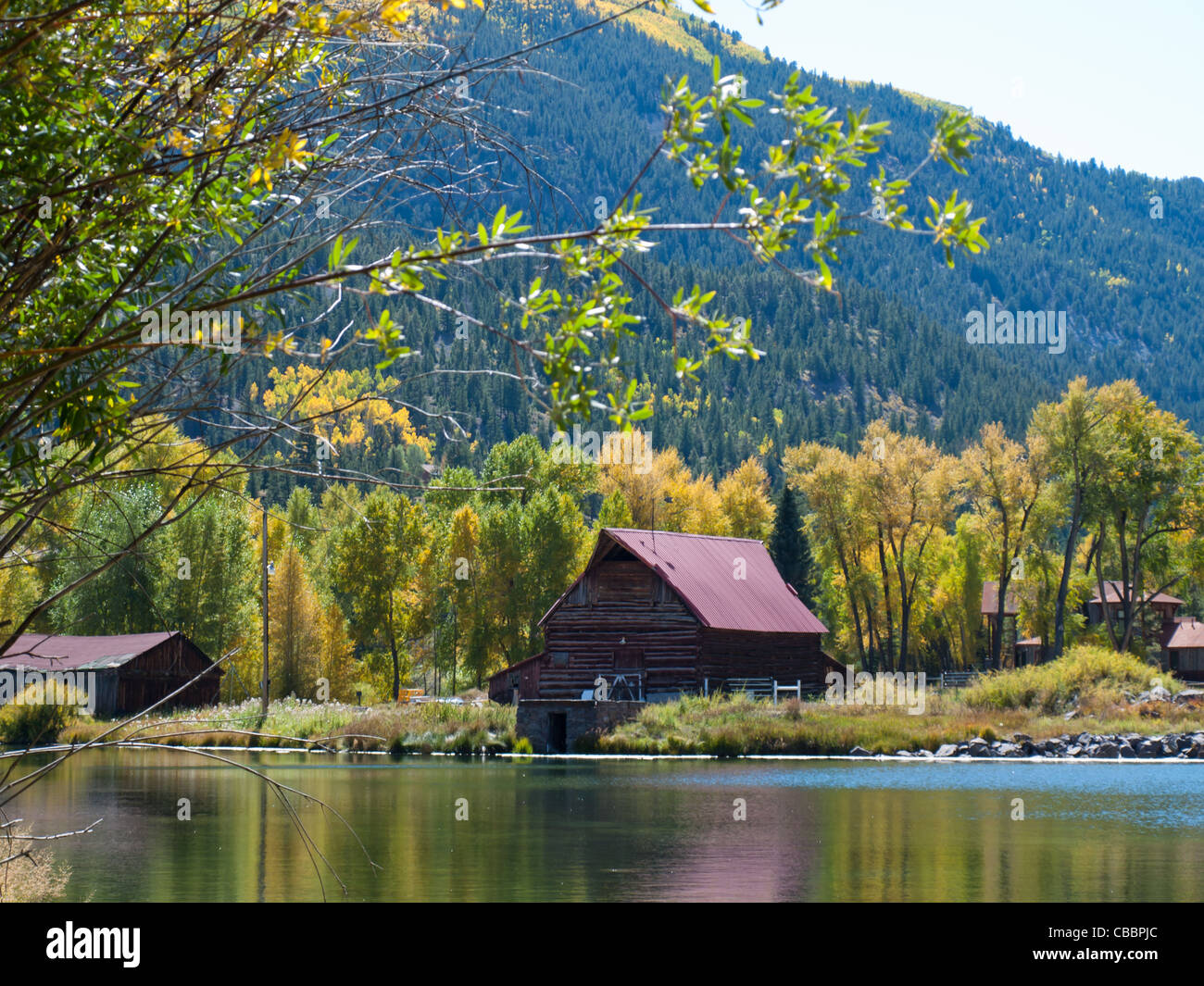 Old barn by the lake in autumn. Near Lake City, Colorado Stock Photo ...