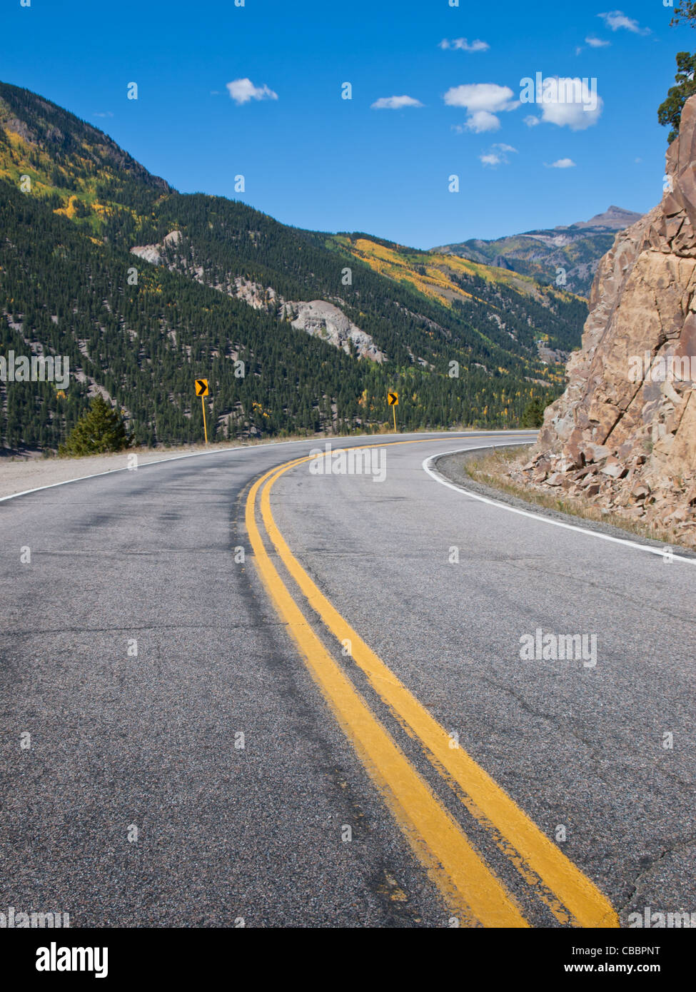 Brilliant fall colors adorn a country road in Colorado Stock Photo - Alamy