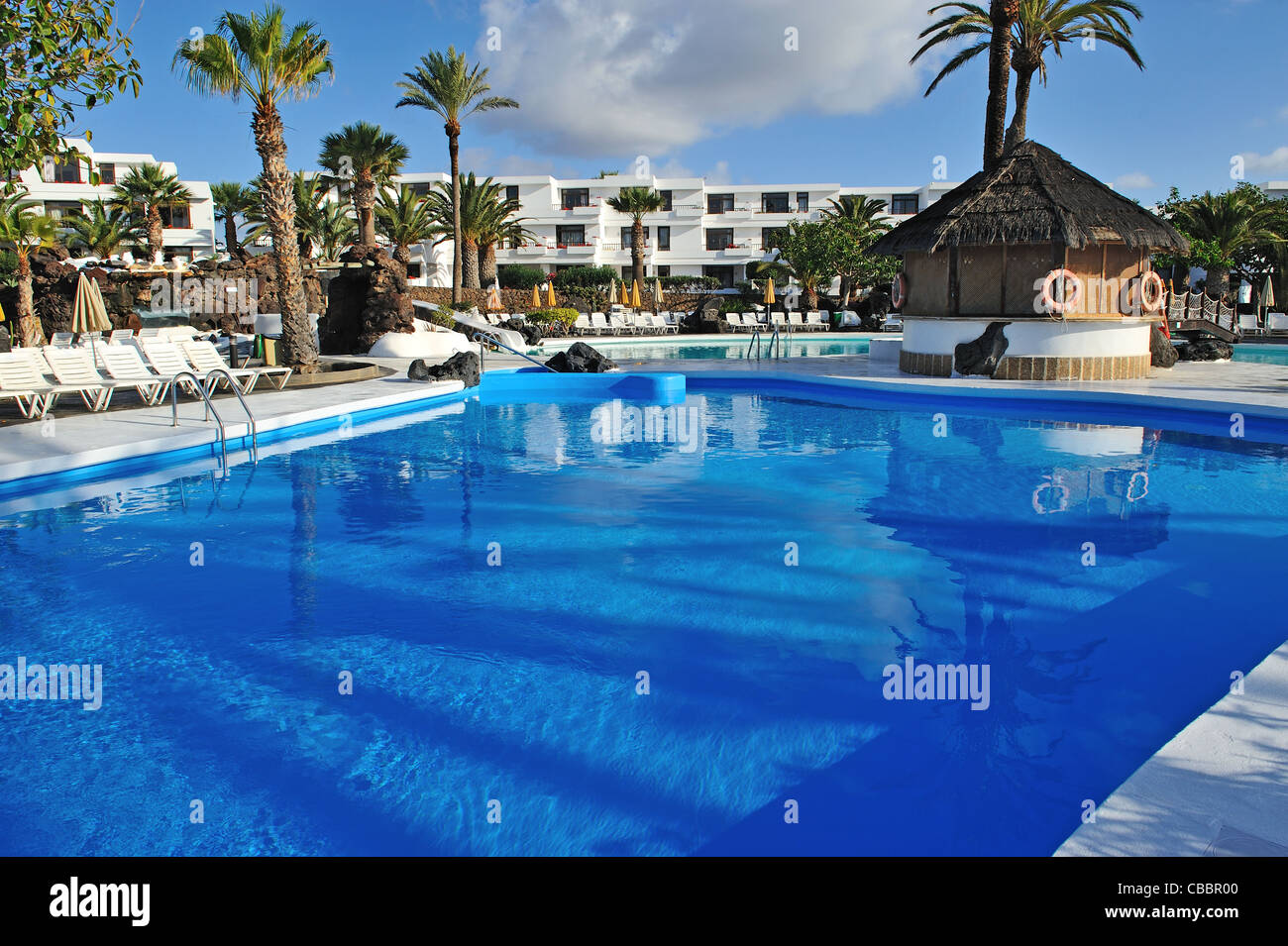 Swimming pool in a resort hotel Stock Photo - Alamy