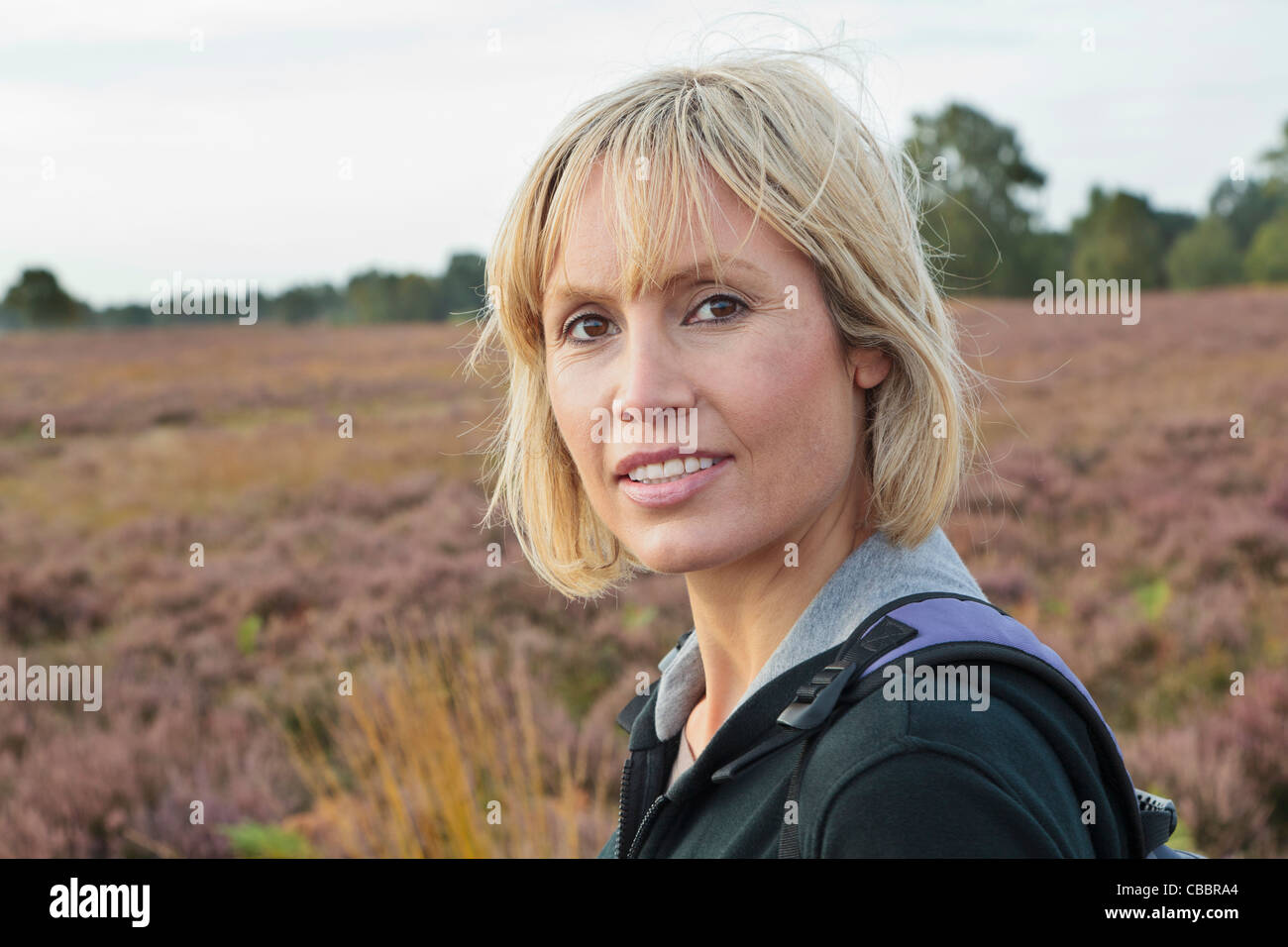 Walking field woman side view outside hi-res stock photography and ...