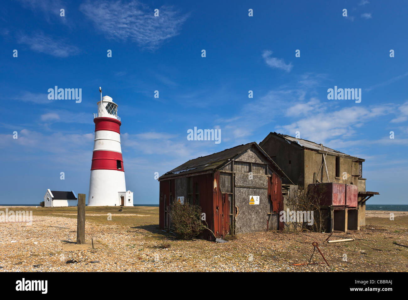 Orford Ness lighthouse and it's out buildings on a sunny summers day ...