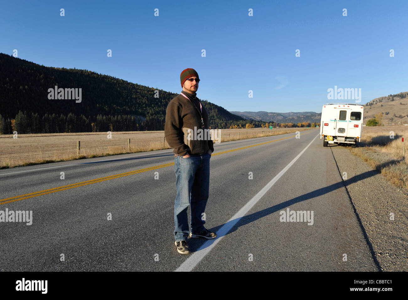 A man stopping on the highway Stock Photo - Alamy
