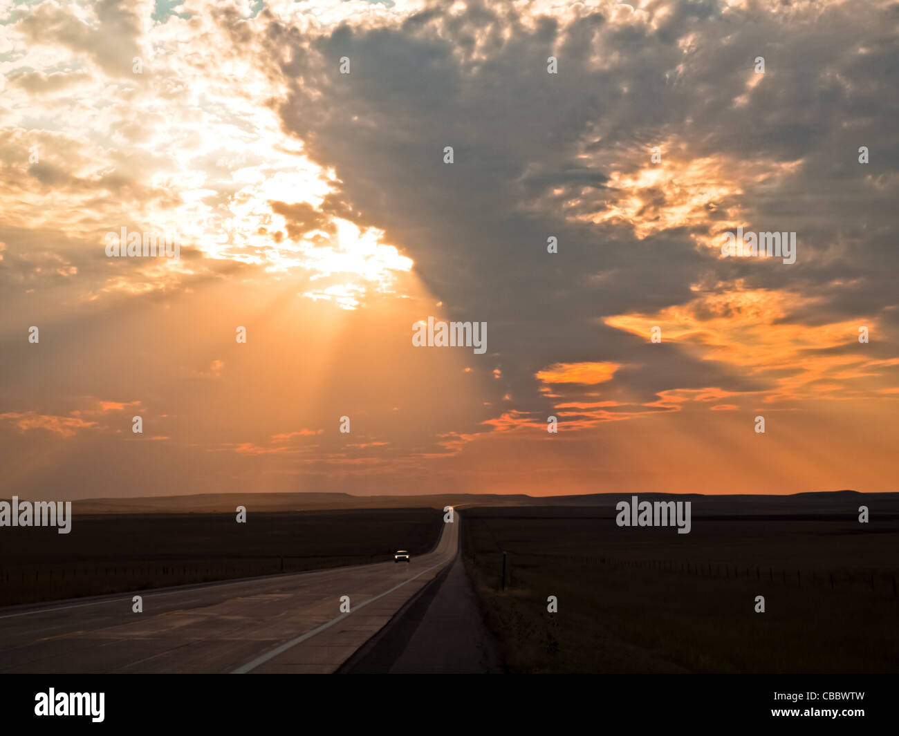 Long road at the sunset in South Dakota Stock Photo - Alamy