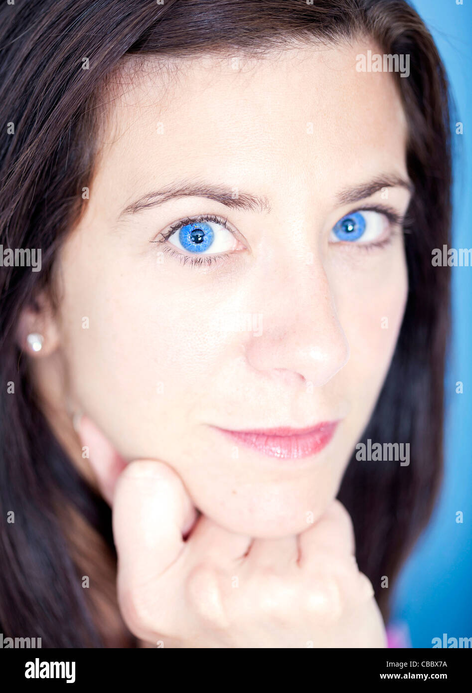 Close up portrait of a woman with blank expression Stock Photo - Alamy
