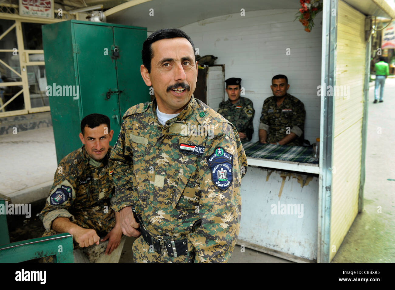 Iraq, Kerbala. Security guards at a checkpoint around the two holy ...