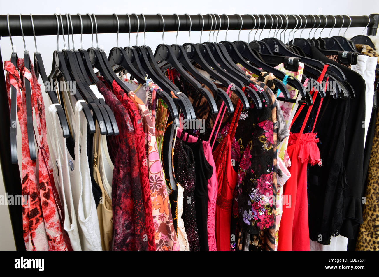 Clothes rail with contemporary young women's clothing from Topshop ...