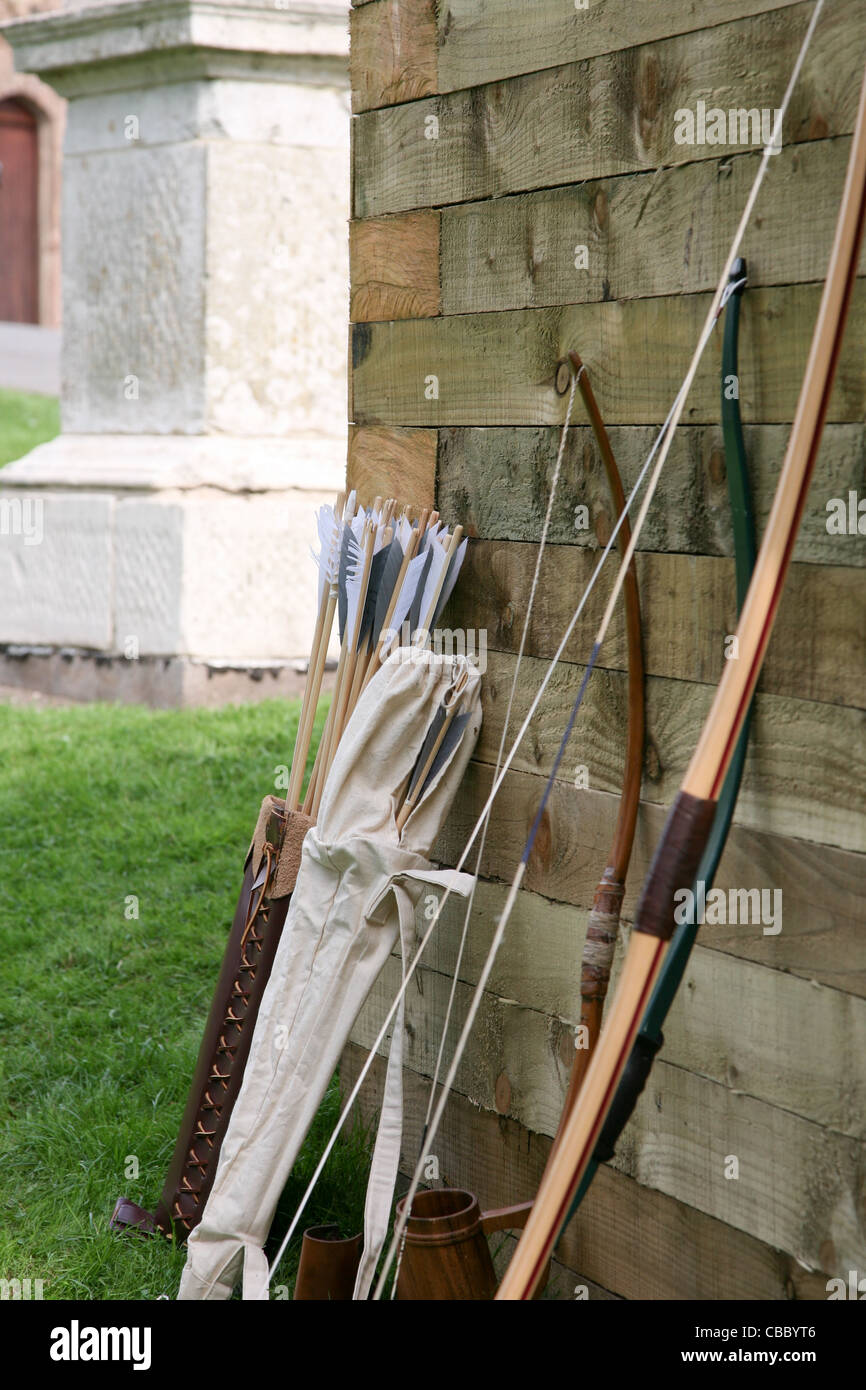 Various bows and two sheaths of arrows Stock Photo - Alamy
