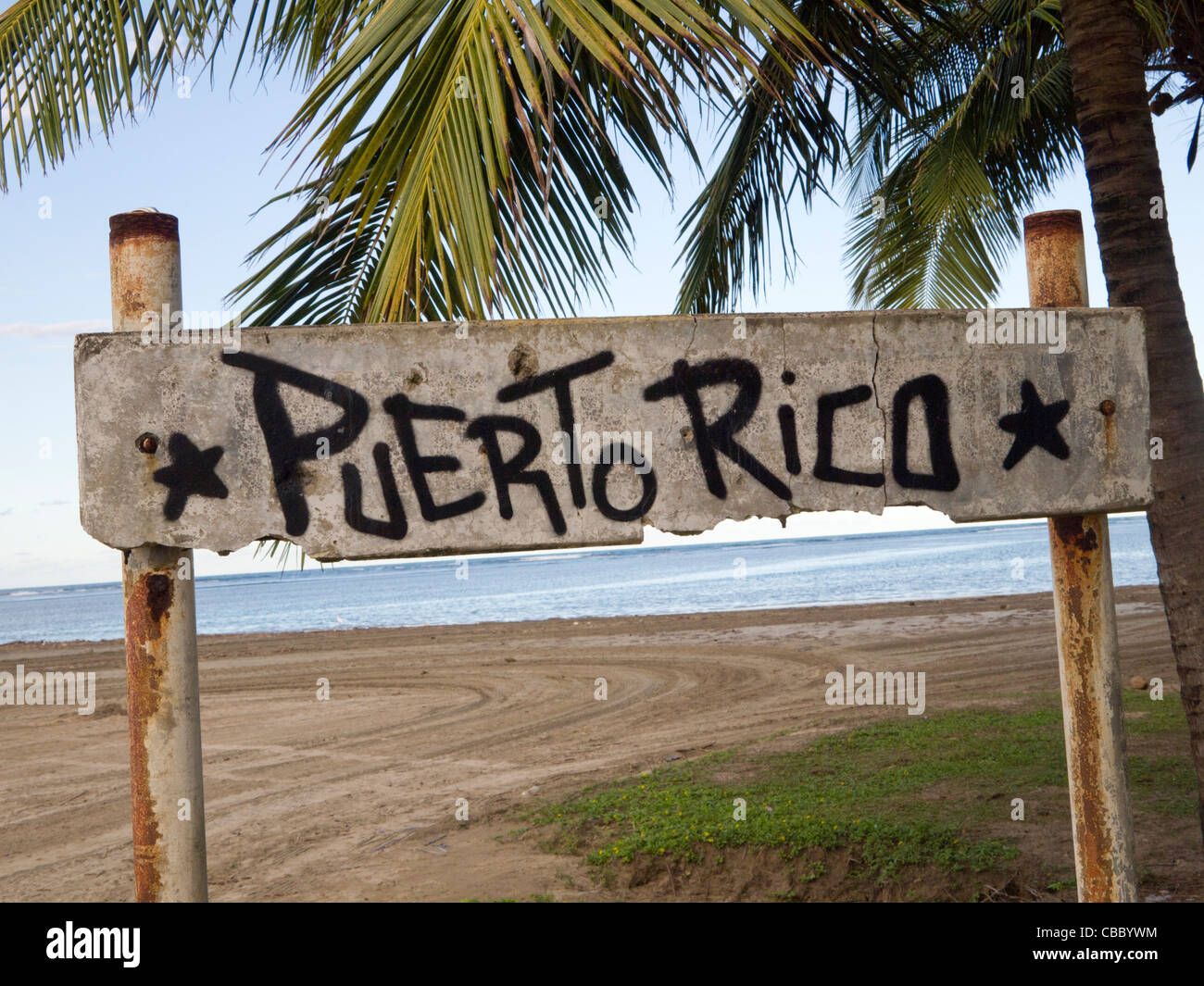 Sign on beach reading "Puerto Rico Stock Photo - Alamy