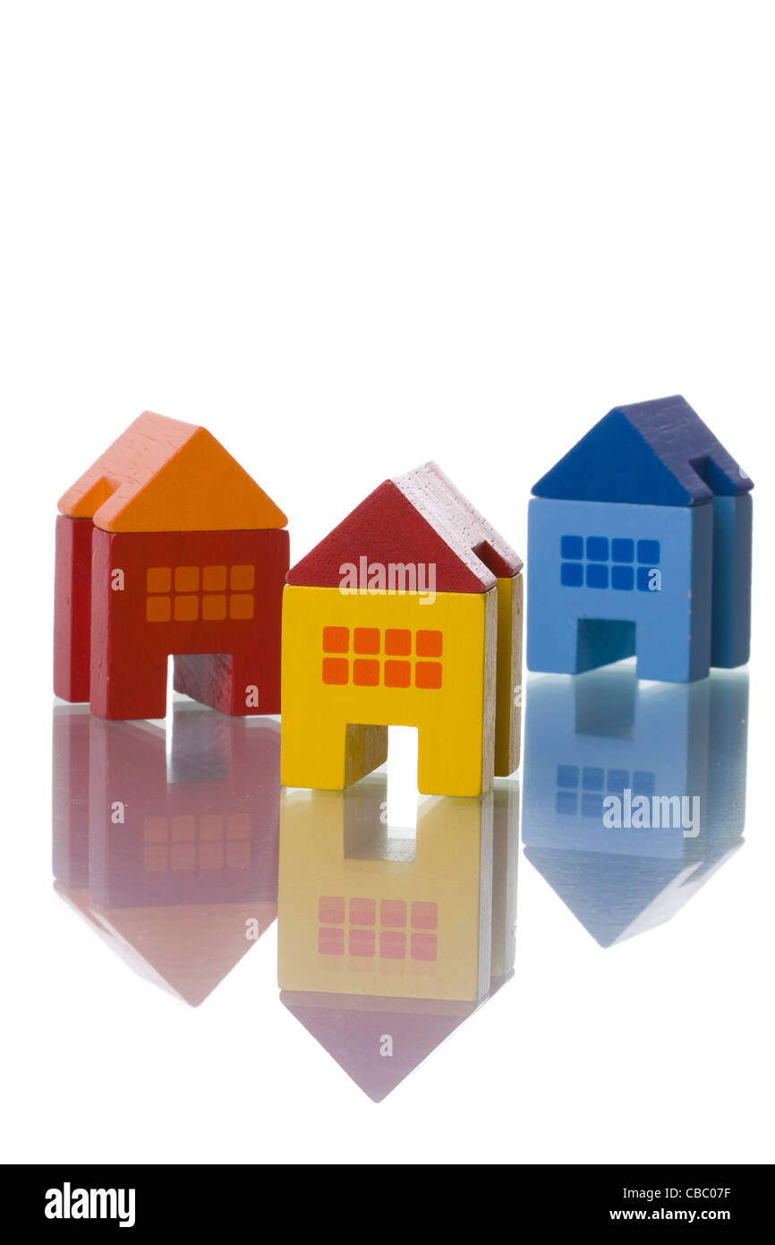 colorful toy houses isolated on white with reflection (selective and ...