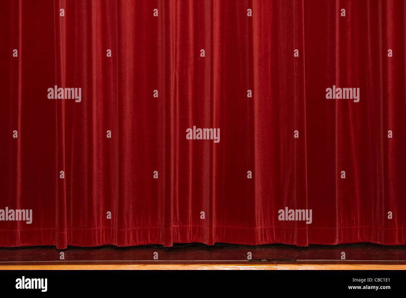 a closed red curtain from a theater Stock Photo - Alamy