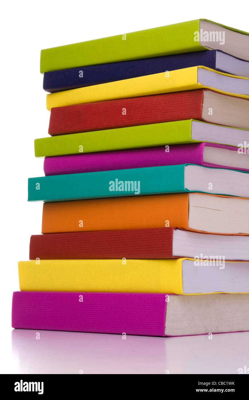 big colorful stack of books isolated with reflection Stock Photo - Alamy