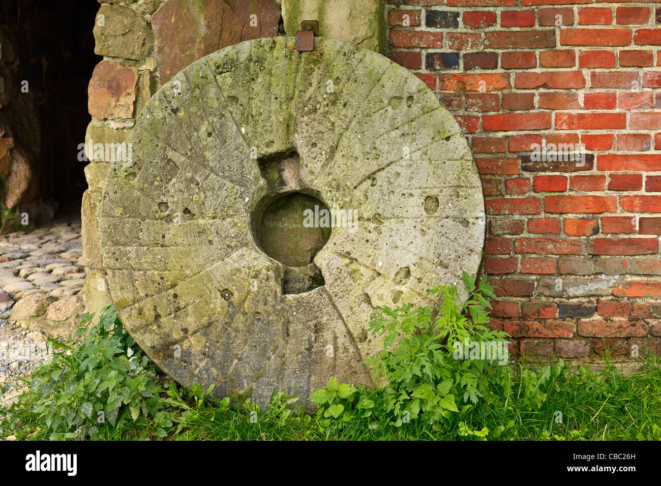 Old stone mill wheel hi-res stock photography and images - Alamy