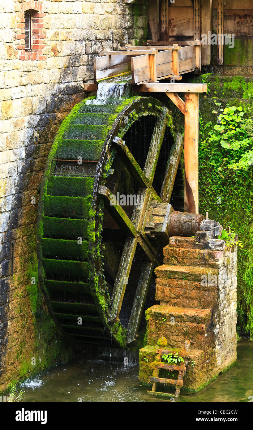 A working wooden water wheel for converting the energy of flowing water ...