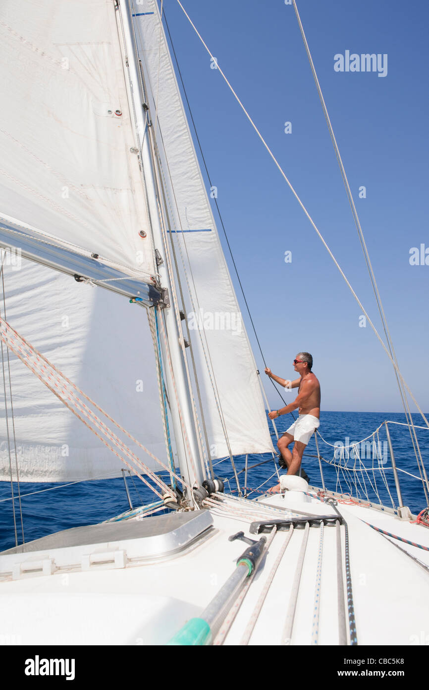 Older man sailing on lake Stock Photo - Alamy