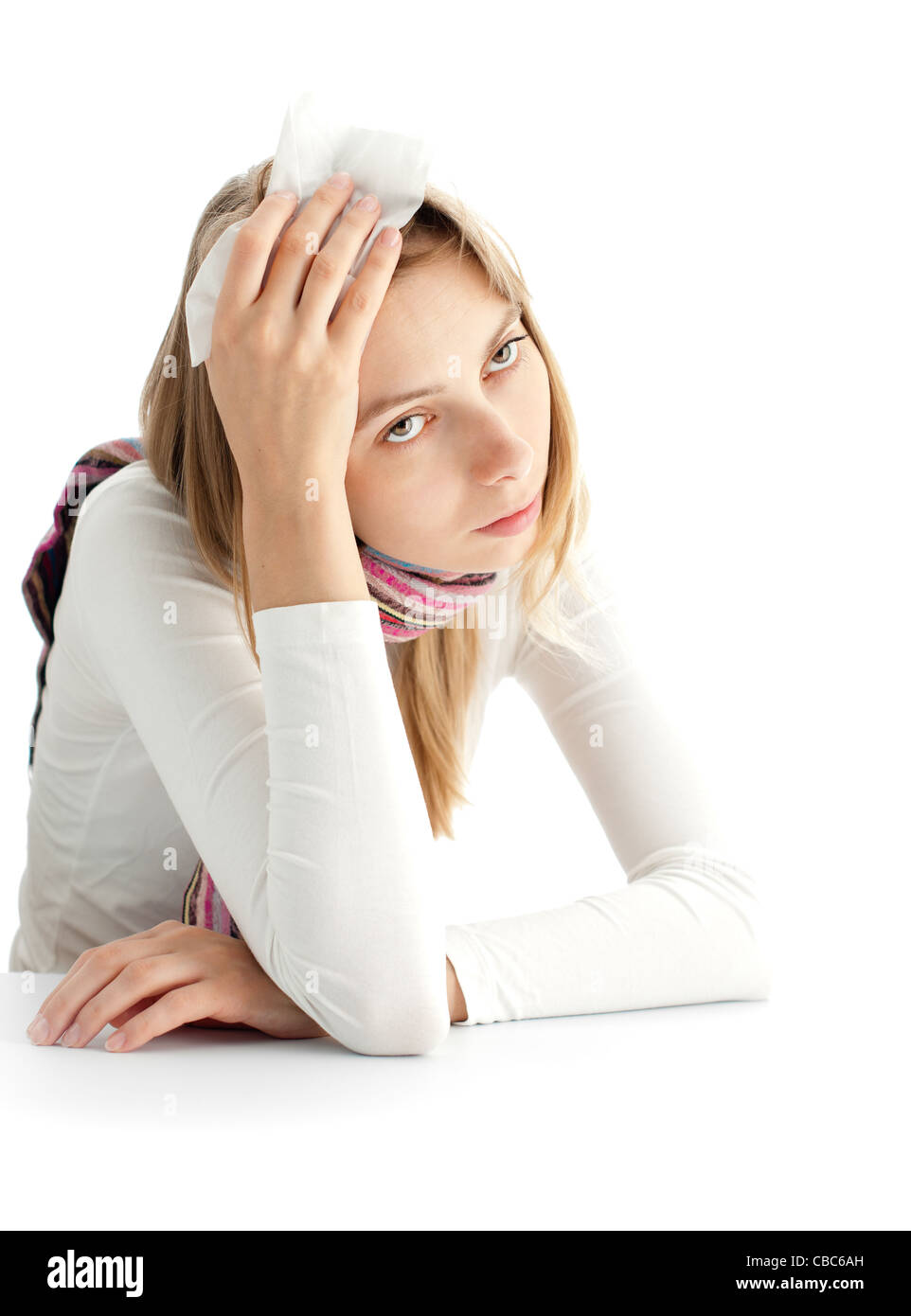 sad beautiful young woman with headache from the cold isolated on white ...
