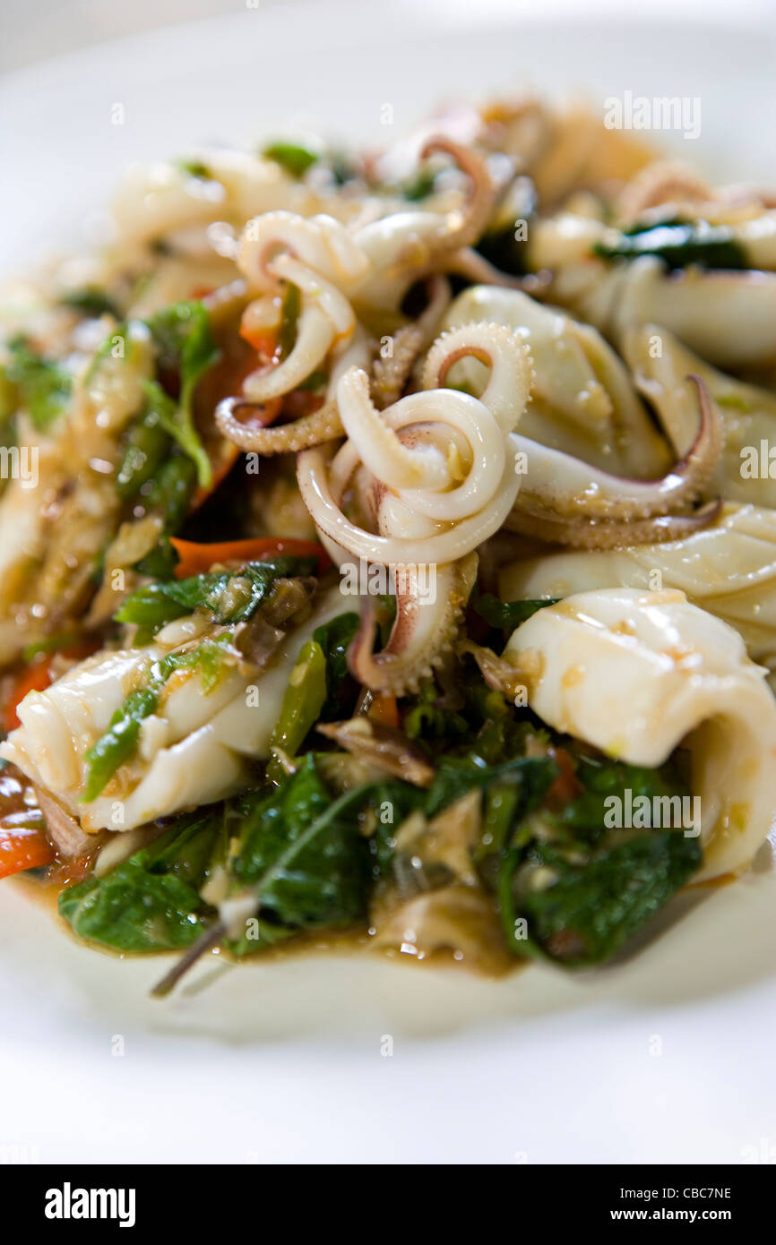 SautŽed squid with basil Stock Photo - Alamy