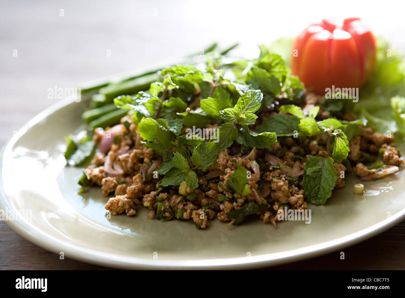 Pork salad with mint Stock Photo - Alamy