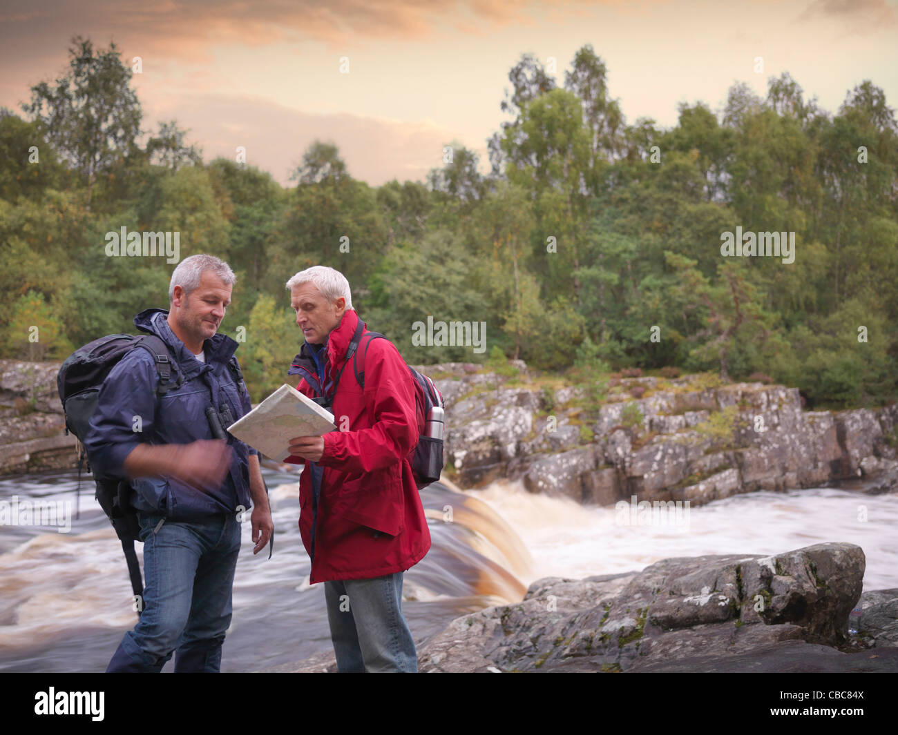 2 men reading map hi-res stock photography and images - Alamy
