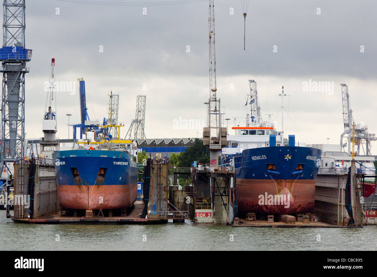 Two ships in dry dock in a shipyard in Rotterdam, The Netherlands Stock ...