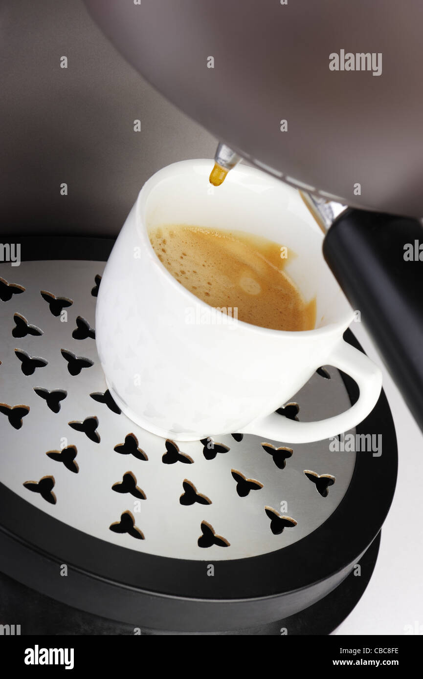 Coffee machine espresso. Process of preparation of coffee. A close up ...