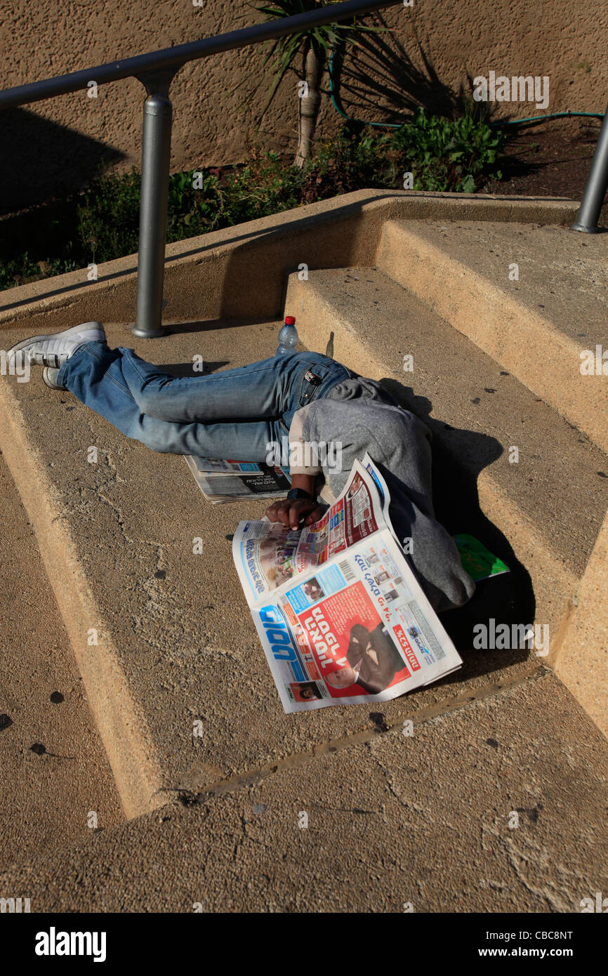 Homeless person sleeping in the street Tel Aviv Israel Stock Photo - Alamy