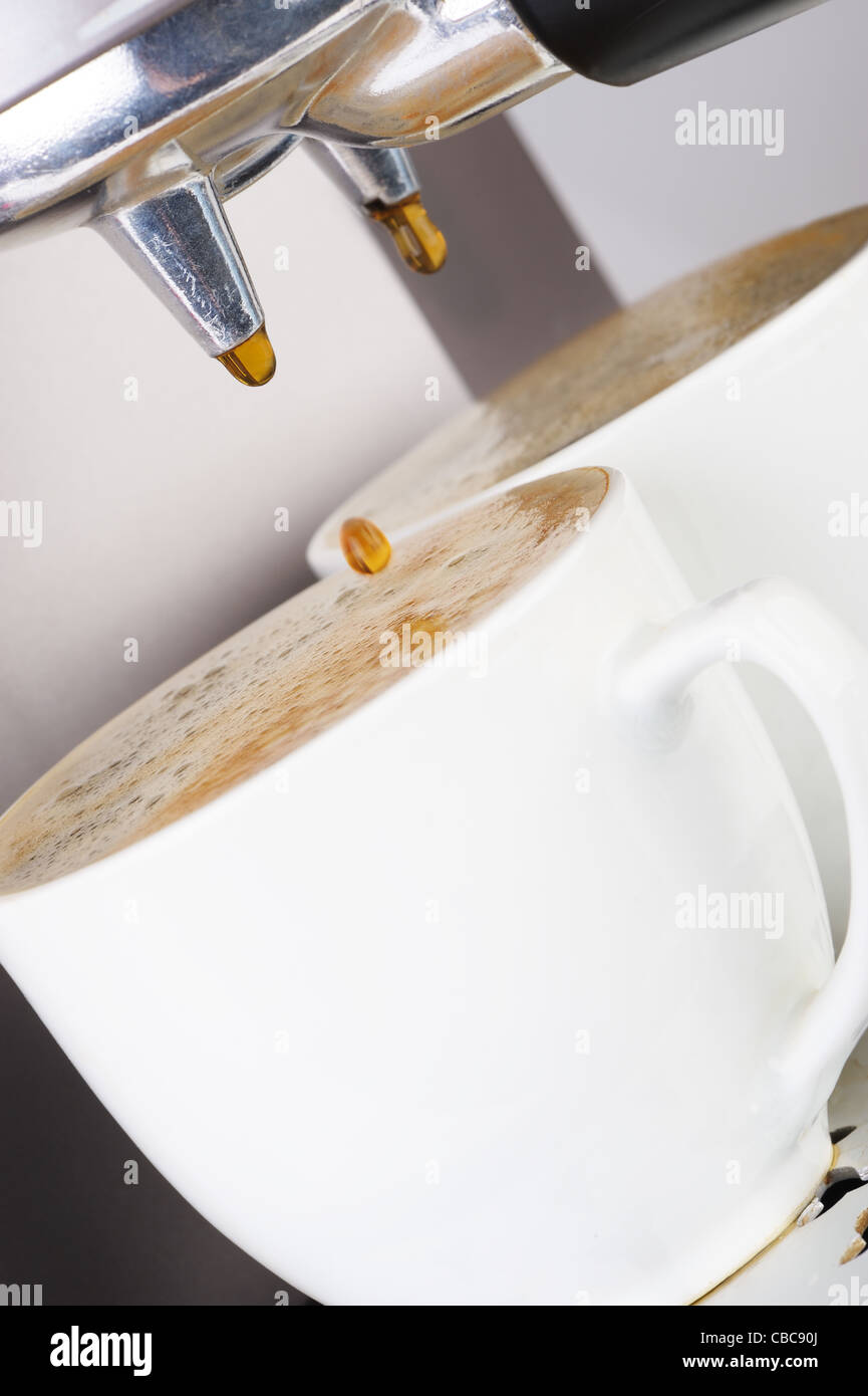 Coffee machine espresso. Process of preparation of coffee. A close up ...