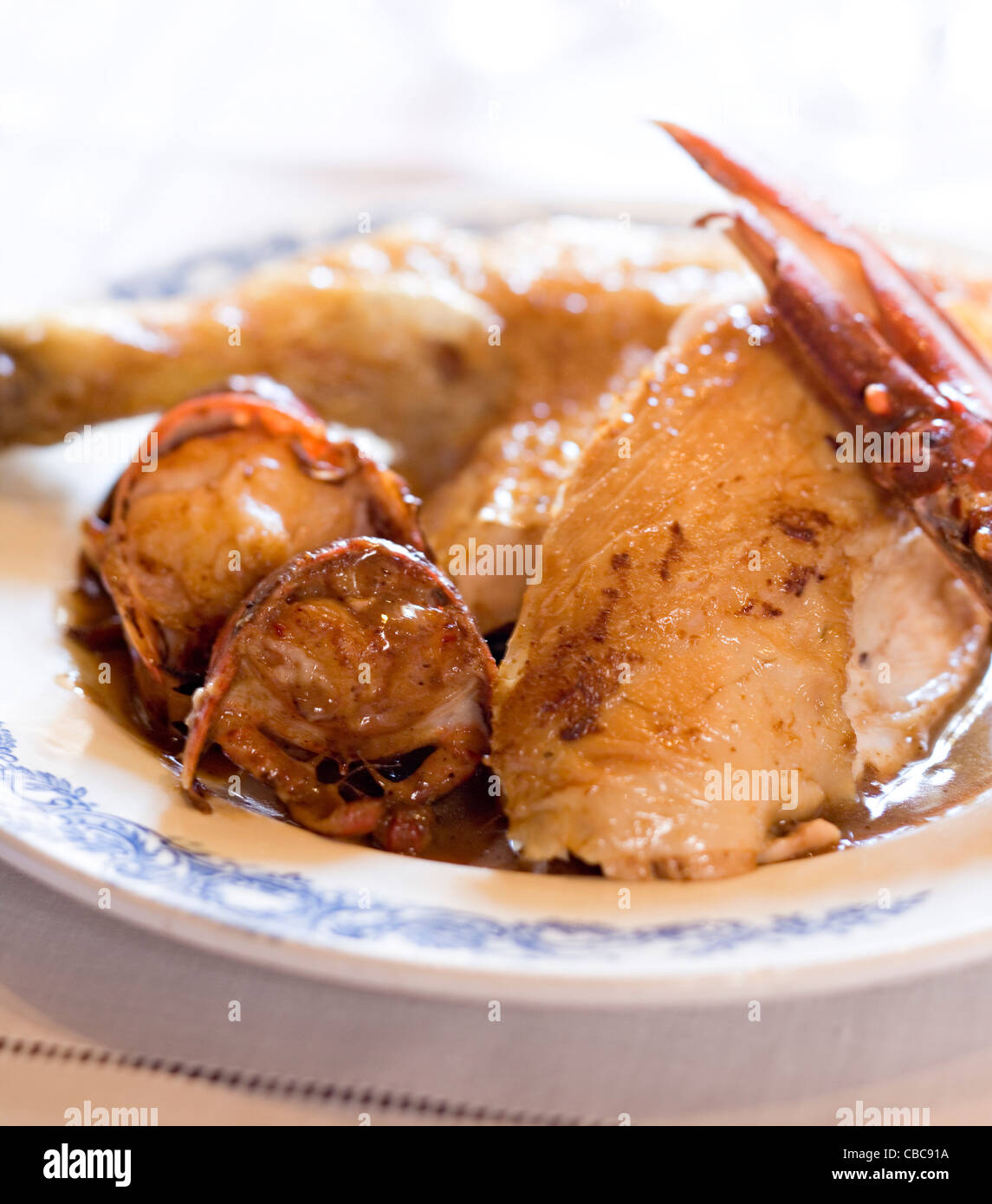 Roast chicken with lobster Stock Photo - Alamy