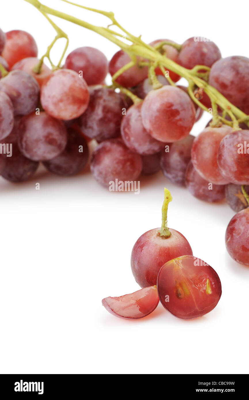 Grapes. Cut on segments grapes berry. It is isolated on a white ...