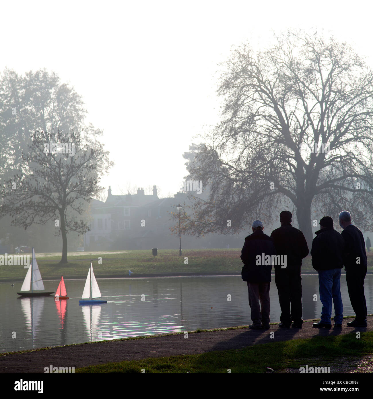Men at Boating Pond in Clapham Stock Photo - Alamy