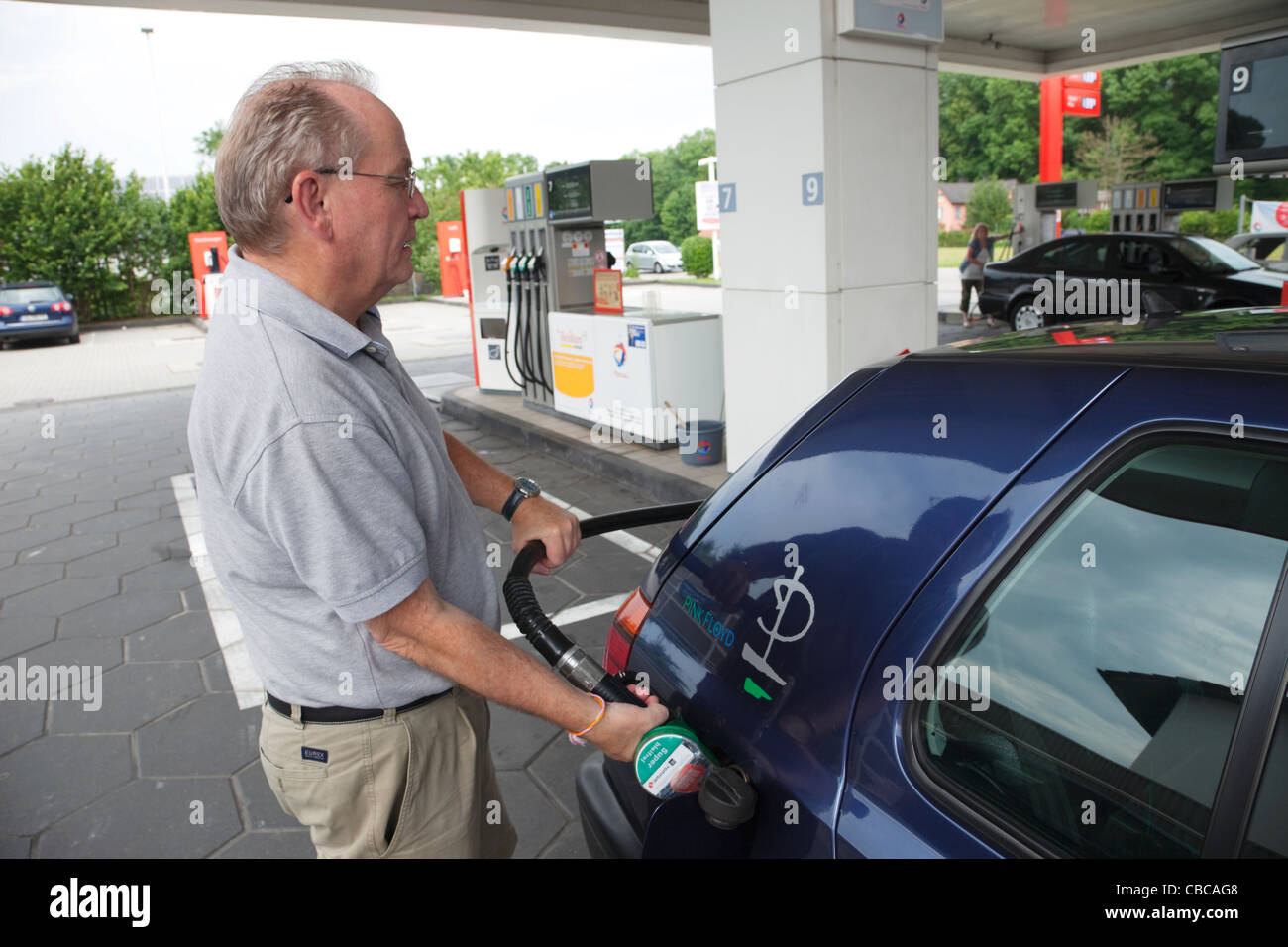 Germany, Bavaria, Munich, Male Driver at Petrol Station Stock Photo - Alamy