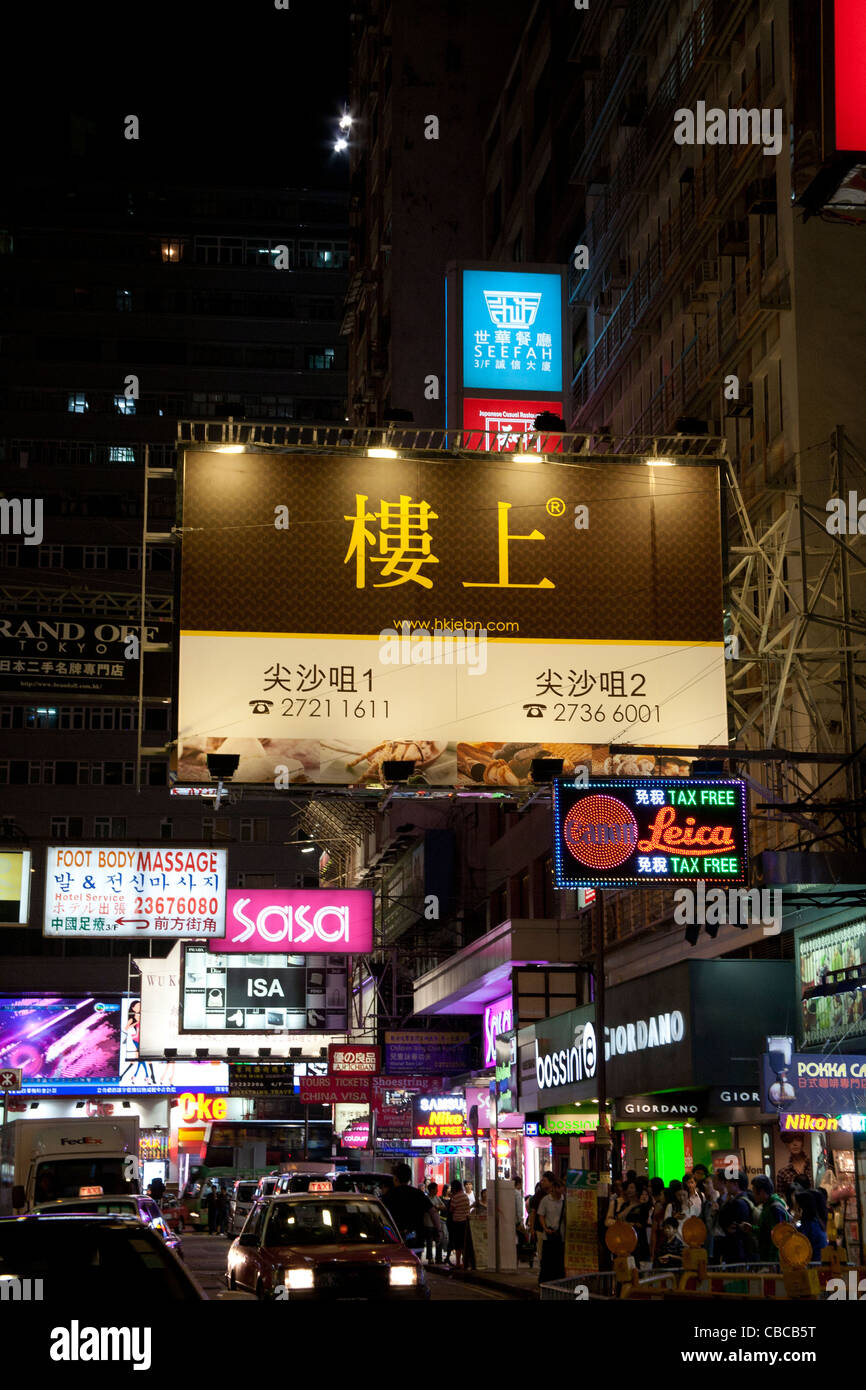 The neon lights and busy street of Nathan Road at night, the main ...