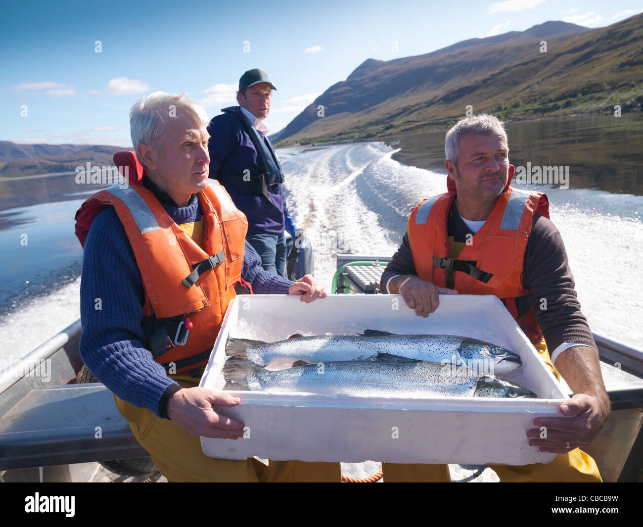 Catching fish on boat hi-res stock photography and images - Alamy