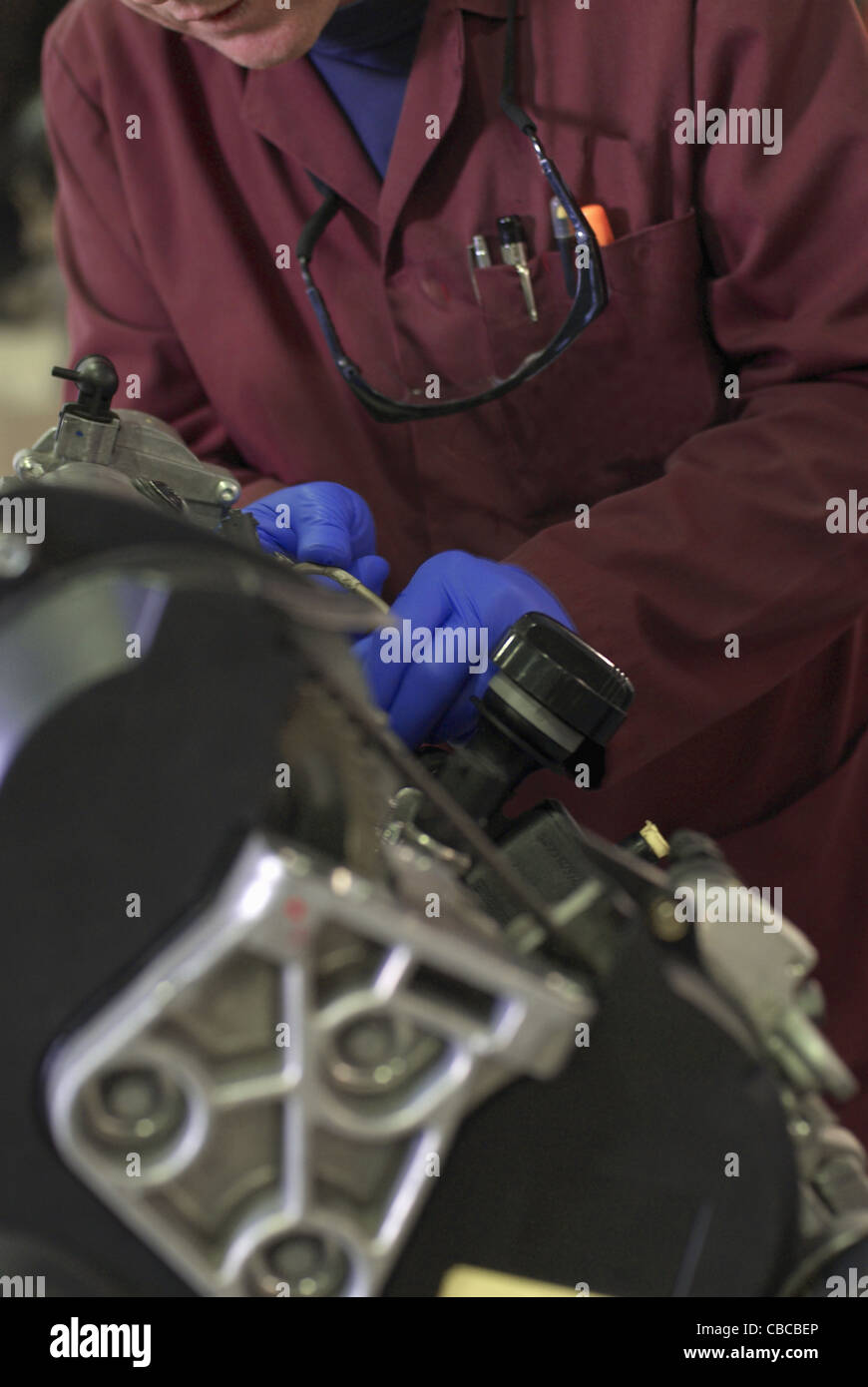 Student working on car engine Stock Photo - Alamy