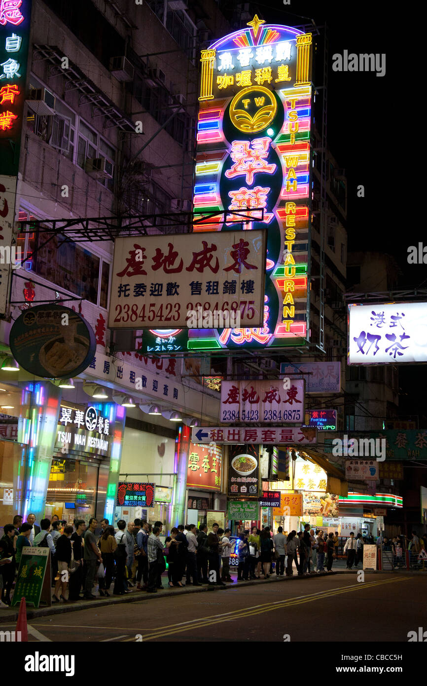 The neon lights and busy street of Nathan Road at night, the main ...