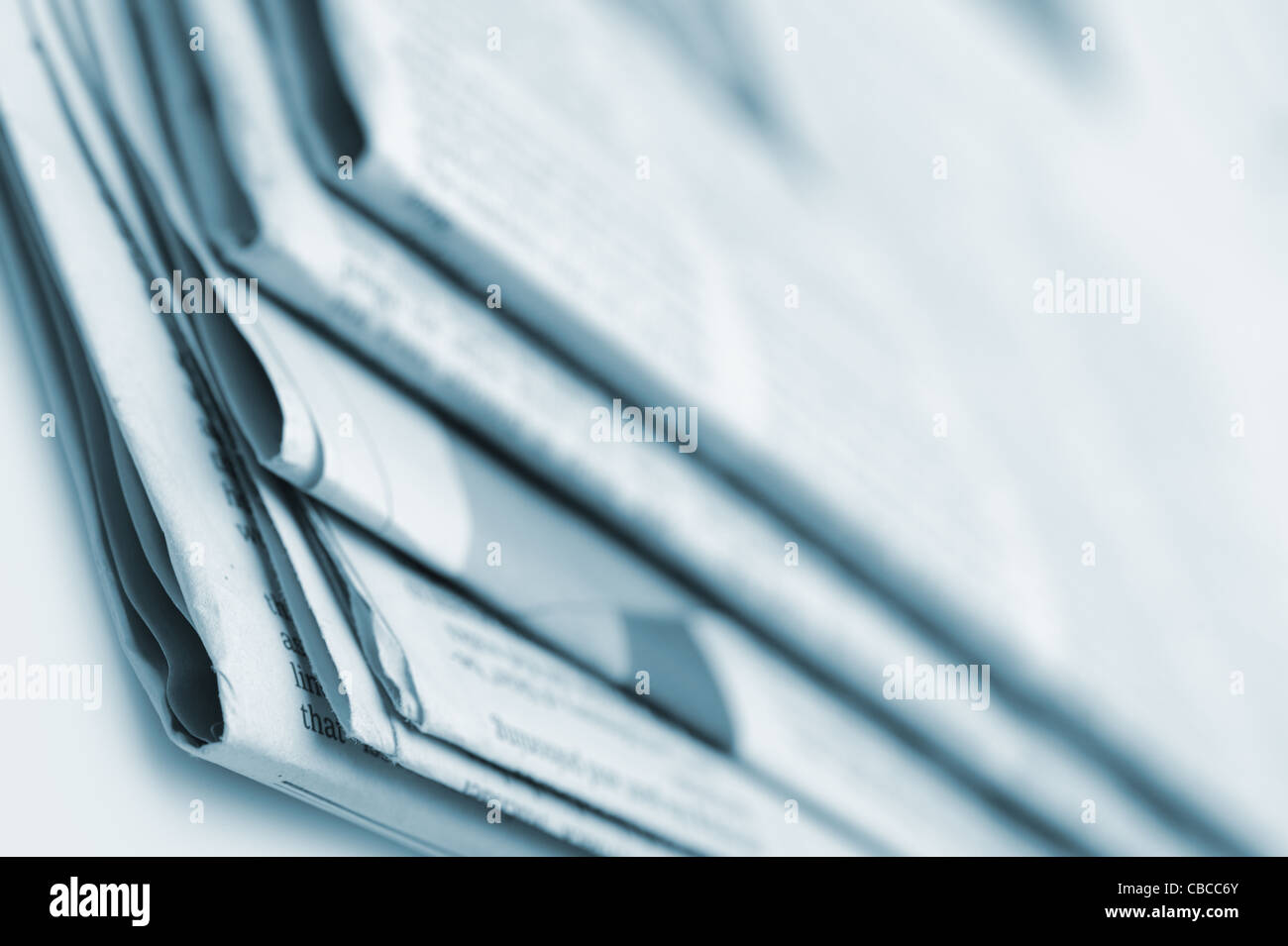 Pile of newspapers blue background hi-res stock photography and images ...