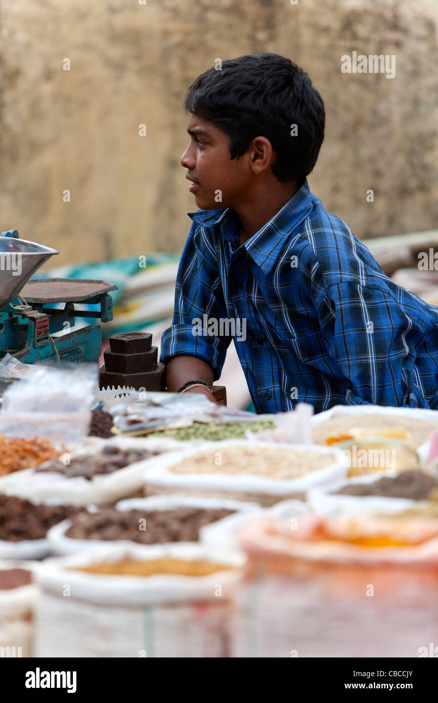 Indian boy selling at market hi-res stock photography and images - Alamy
