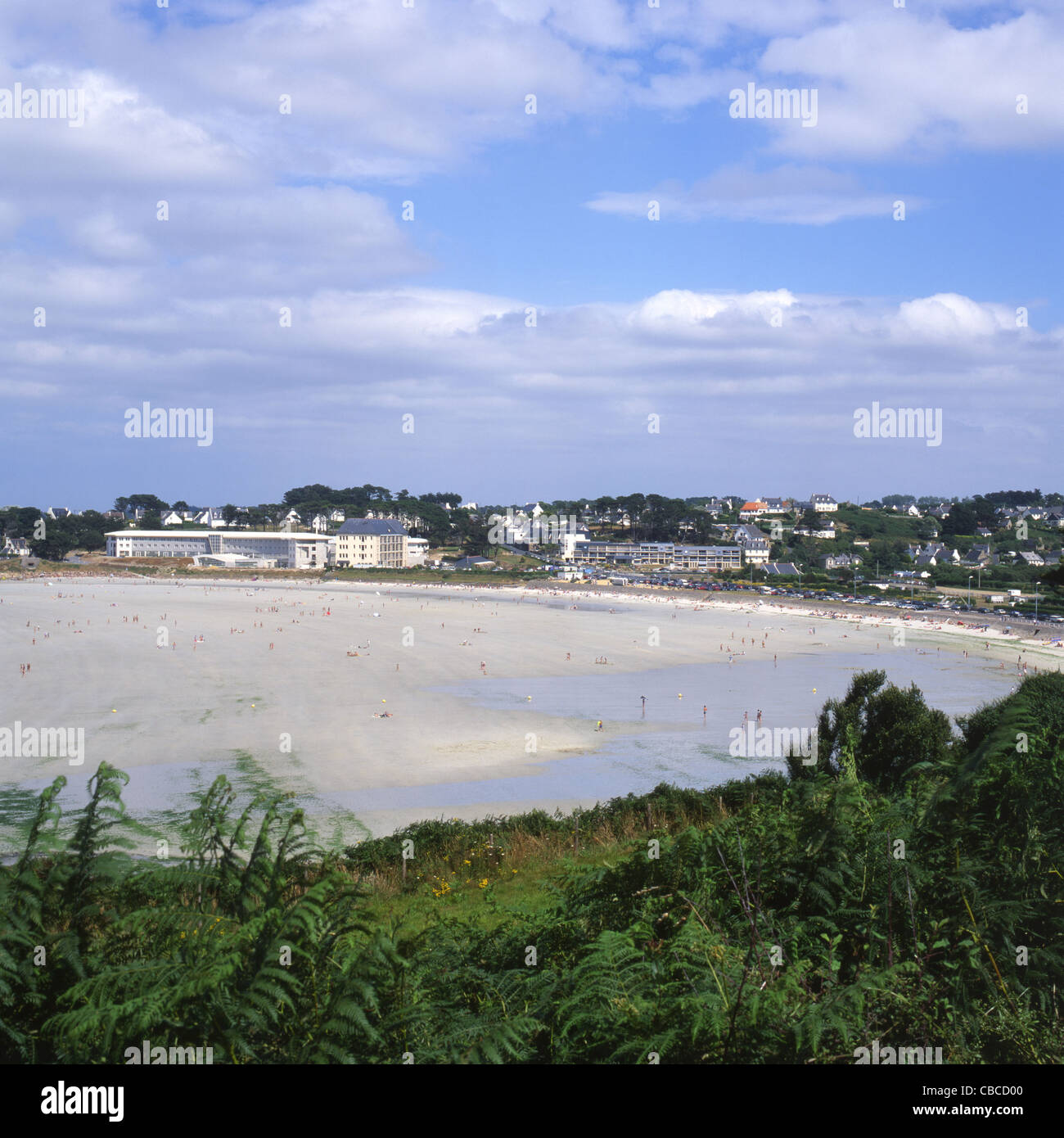 People sunbathing and playing on Trestal Beach. Brittany. France Stock ...