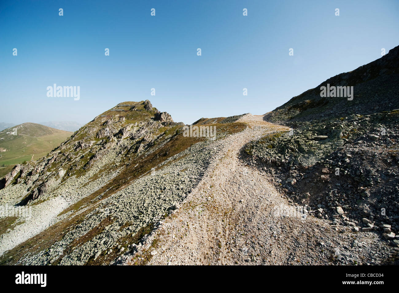 Scree covered mountainside in summer with a blue sky Stock Photo - Alamy