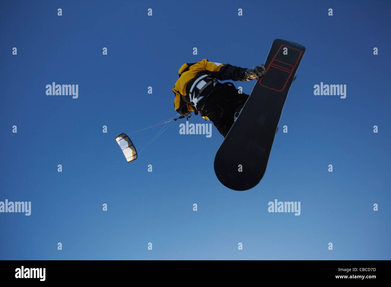 Man windsurfing on snowboard Stock Photo - Alamy