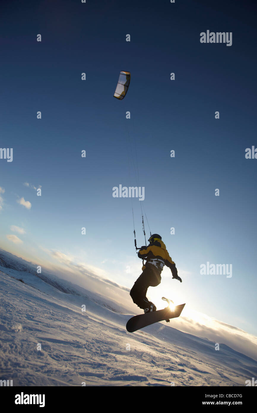 Man windsurfing on snowboard Stock Photo - Alamy