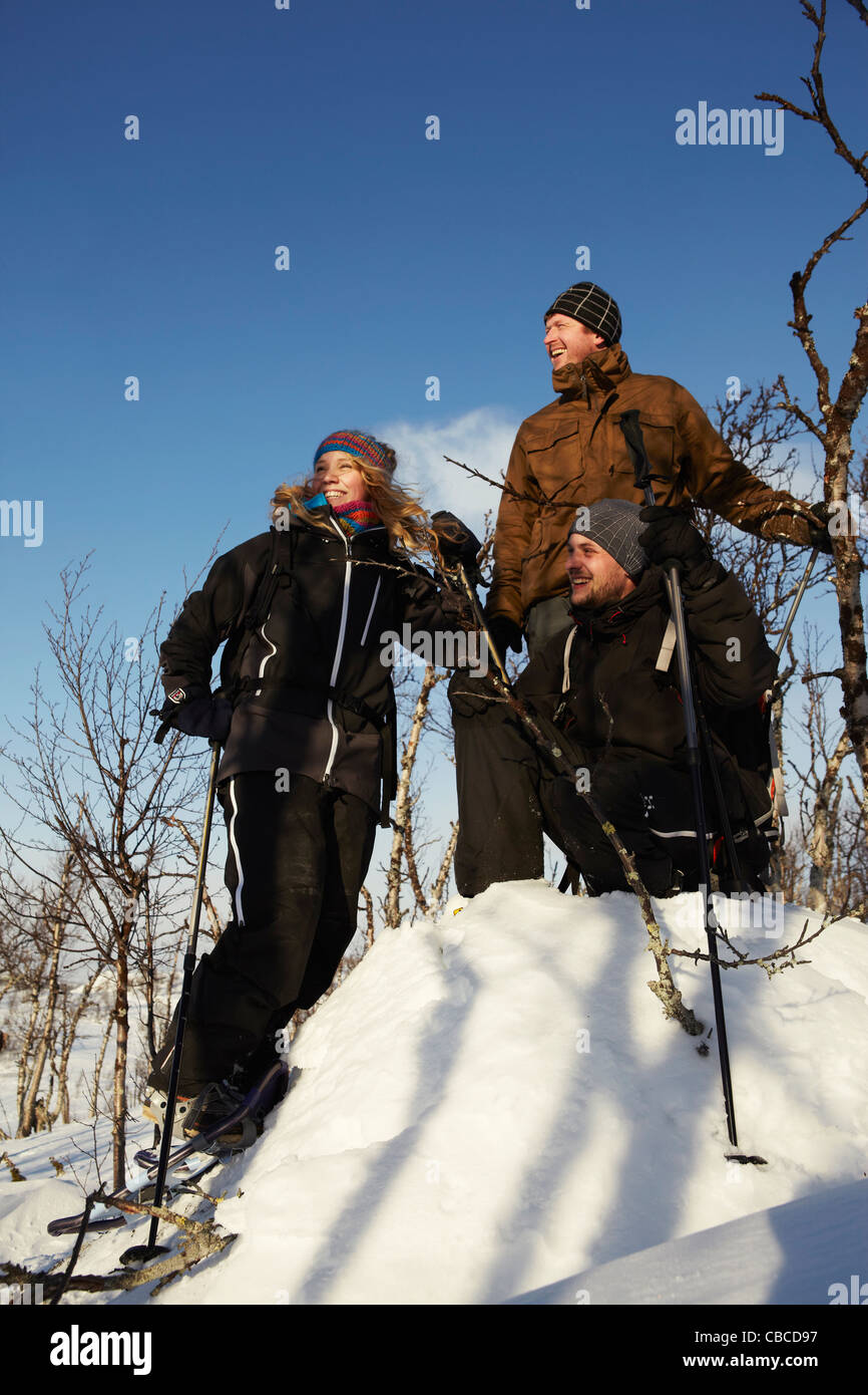 Cross-country skiers resting in snow Stock Photo - Alamy