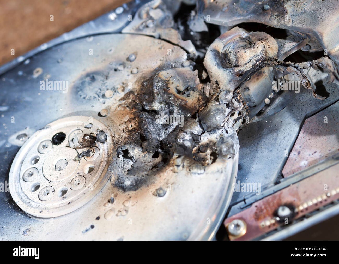 detail shot of a massive destroyed hard disk drive Stock Photo - Alamy
