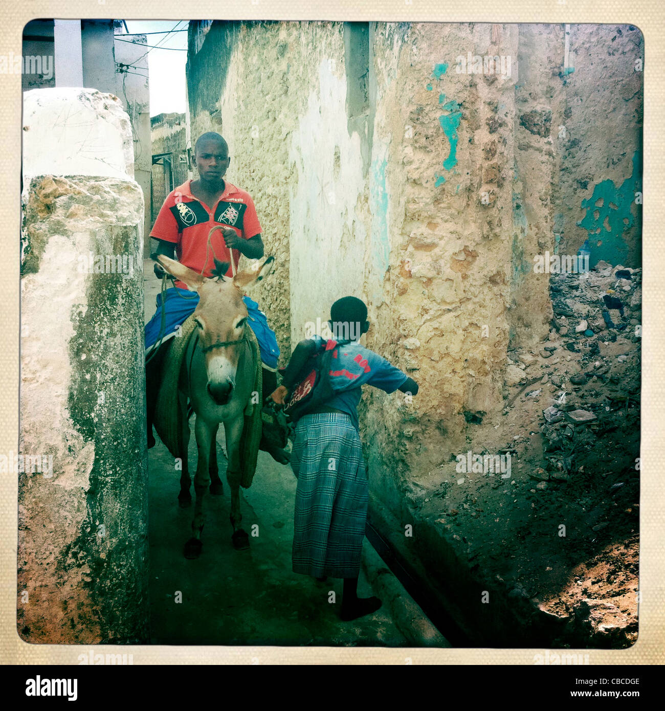 Children riding a donkey hi-res stock photography and images - Alamy