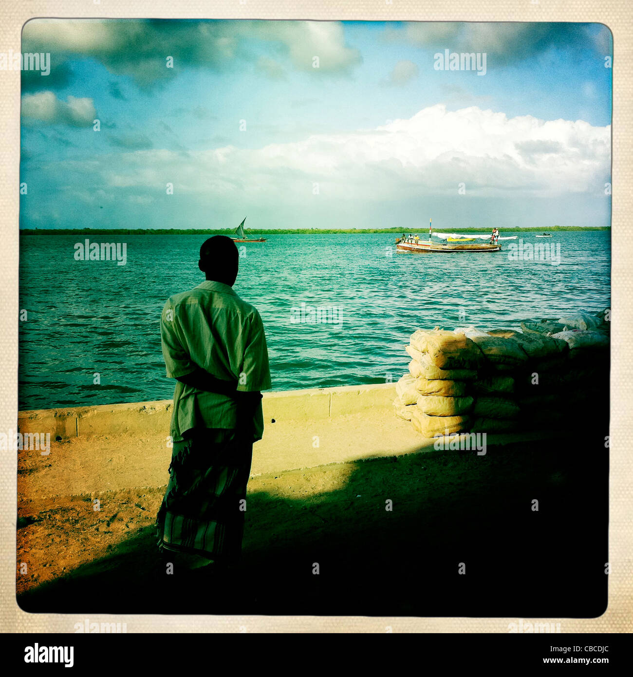 Indian ocean man looking blue sky transportation hi-res stock ...