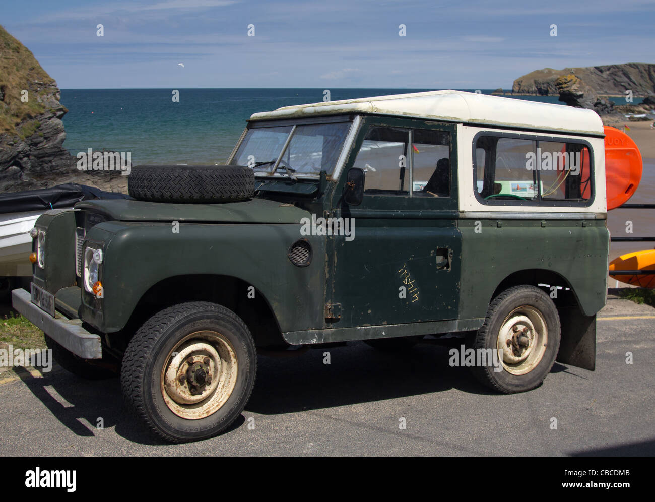 Old green and white landrover Stock Photo - Alamy